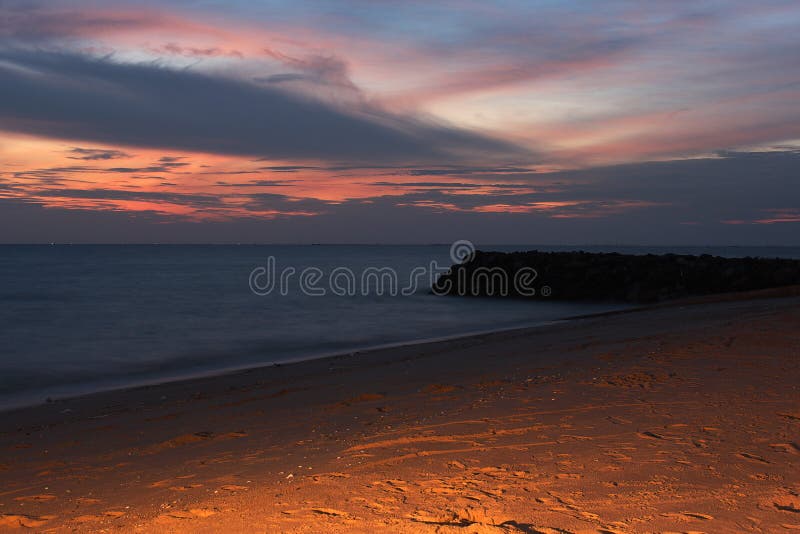 Sunset Scene on the Beach with the Light Beam on the Sky Stock Photo ...