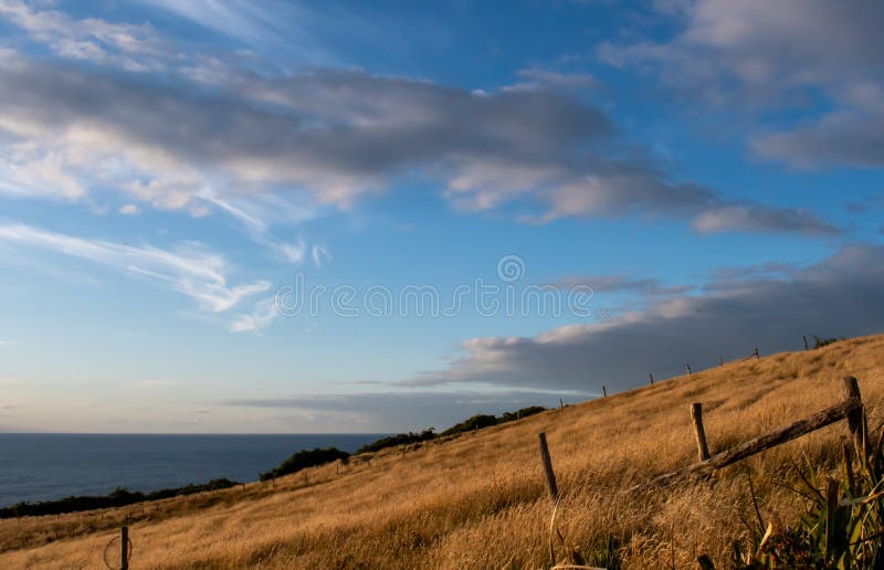 Sunset Scene on a Farm with Ocean Behind at Chiloe Island, Chile Stock ...