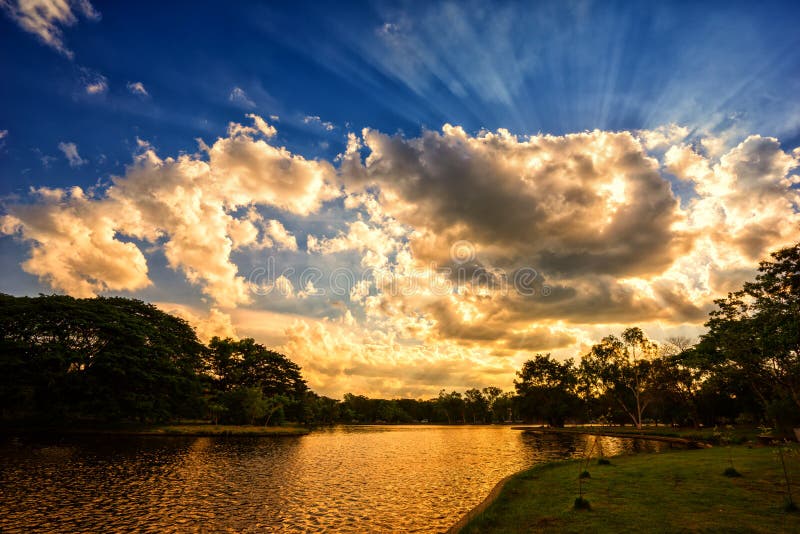 Sunset Scene on Lake with Beautiful Clouds and Sky Stock Image - Image ...