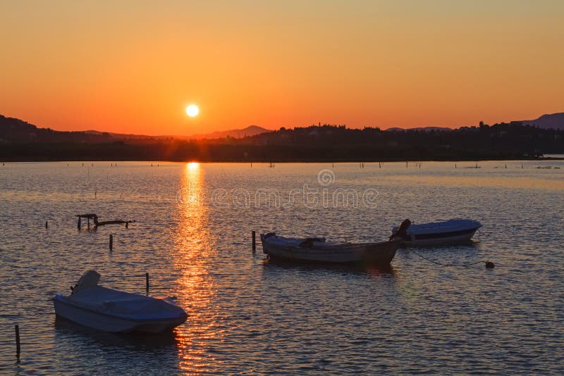 Sunset Scene with Nets and Boat Stock Photo - Image of coast, ocean ...