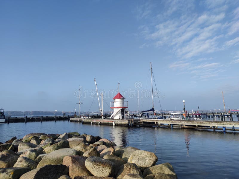 Baltic Sea with Empty Harbor and Small Lighthouse Stock Photo - Image ...