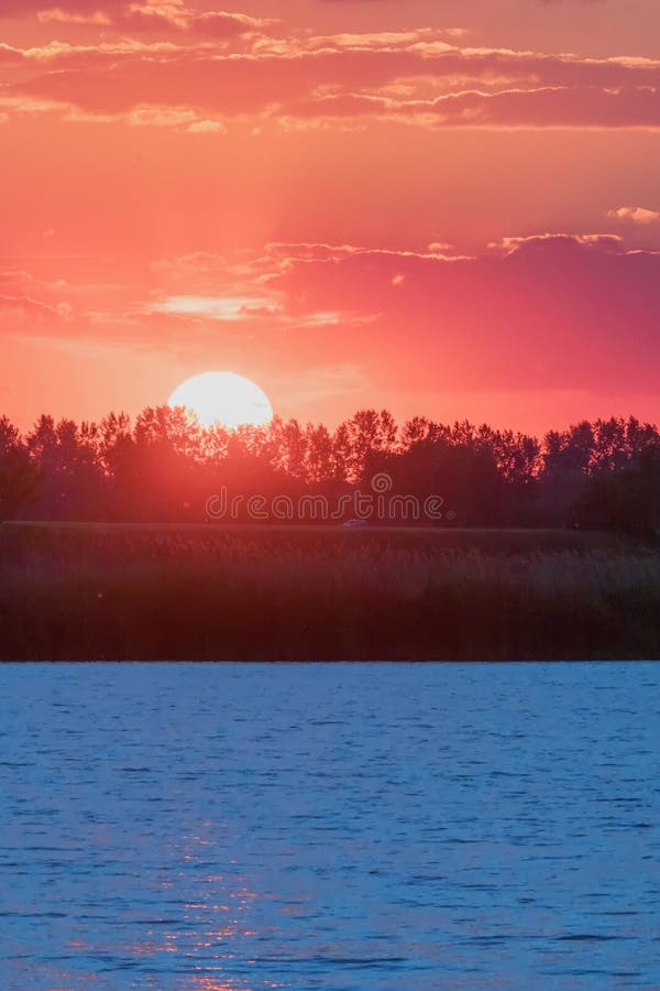Sunset Scene Over Lake, Water Surface Sunset Stock Image - Image of ...