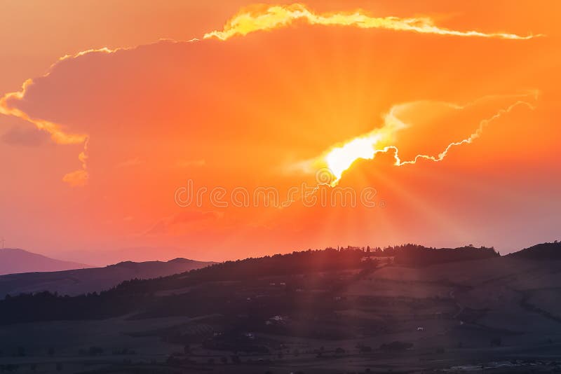 Sunset Scene with Sun Fall Behind the Clouds and Mountains in Ba Stock ...