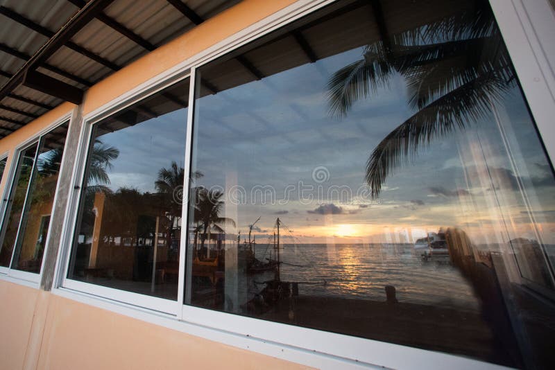 Sunset Scenes Reflection on Window of Building. Stock Image - Image of ...