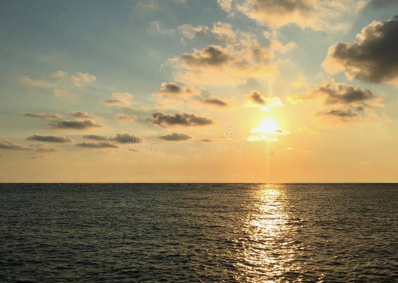 Sunset at Sea with a Beautiful Light. Stock Photo - Image of sunlight ...