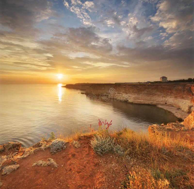 Sunset on he sea cliffs stock photo. Image of scenic - 164198112
