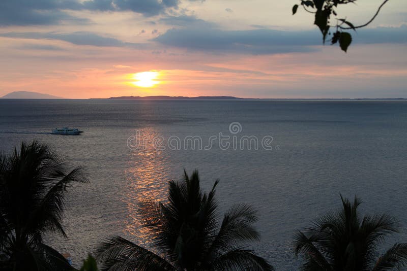 Sunset in the sea stock image. Image of tagaytay, locomotion - 60435057