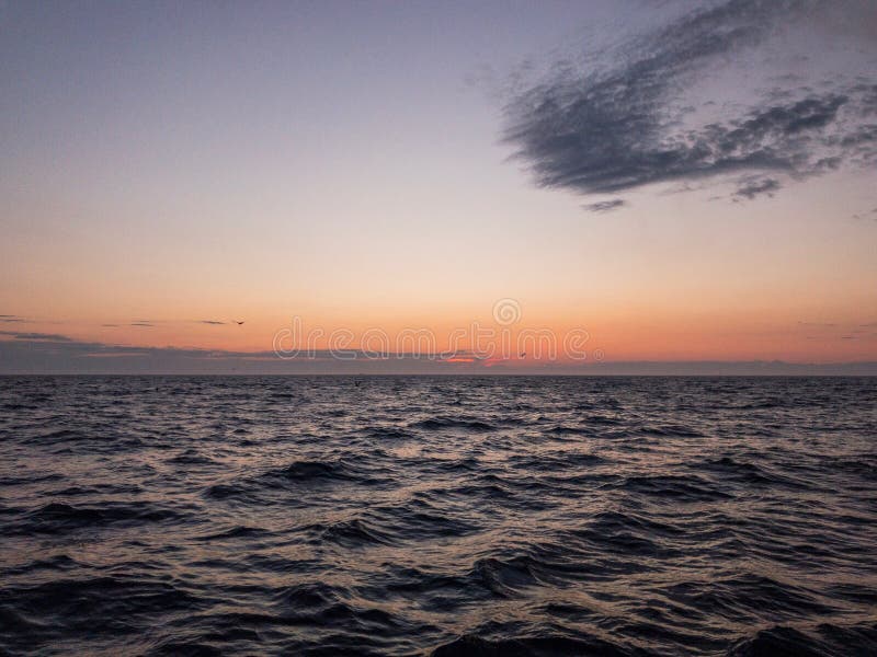Sunset in the Sea. the End of a Beautiful Day Stock Image - Image of ...
