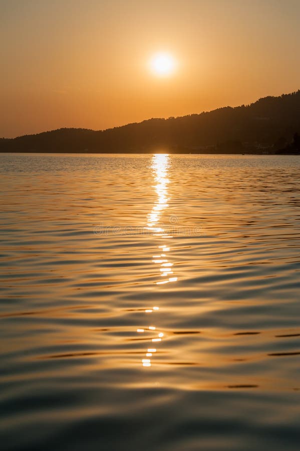 Sunset at sea level stock image. Image of summer, sunset - 58707669