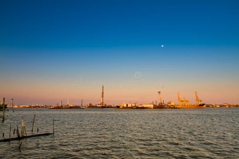 Sunset at sea port stock photo. Image of beacon, convey - 52283638