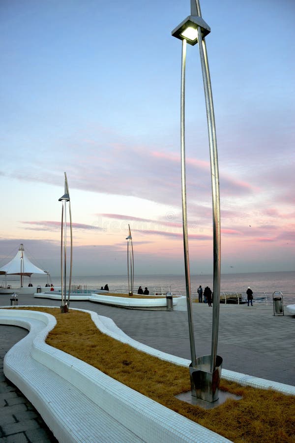 Sunset on the Sea Promenade. Stock Image - Image of beach, lighting ...