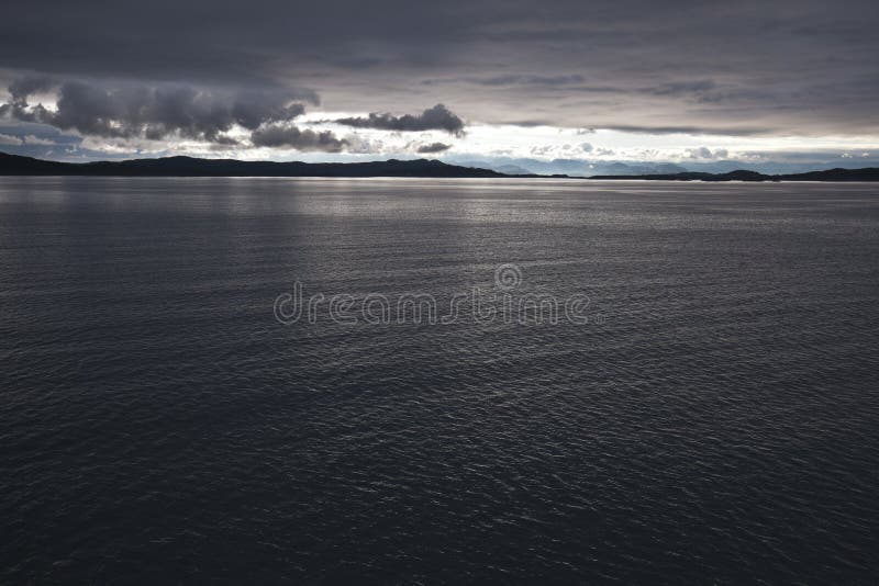 Sunset at the Sea with Smooth Water Stock Image - Image of inlet, ocean ...