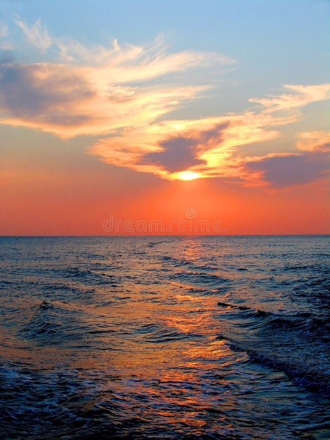 Sunset on the Sea with Solar Path Stock Photo - Image of path, burgundy ...