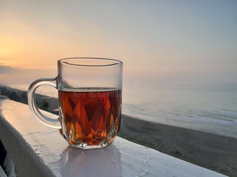 Sunset, Sea & Tea stock photo. Image of sunset, terrace - 333840958