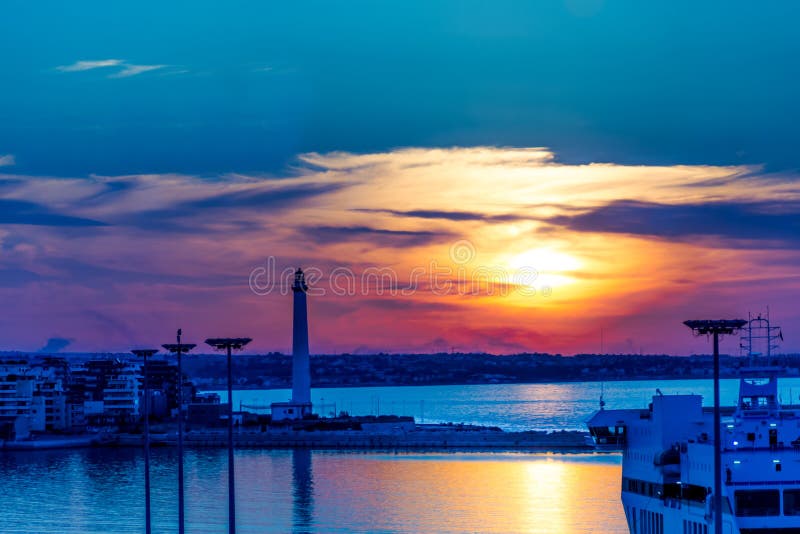 Sunset at sea trading port stock image. Image of nautical - 79643047