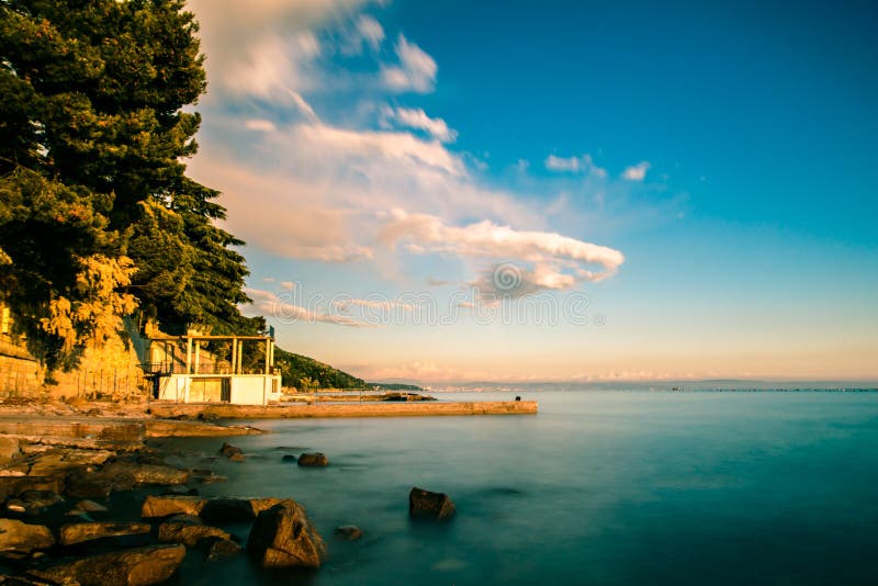 Sunset at the sea, Trieste stock photo. Image of mediterranean - 136421656