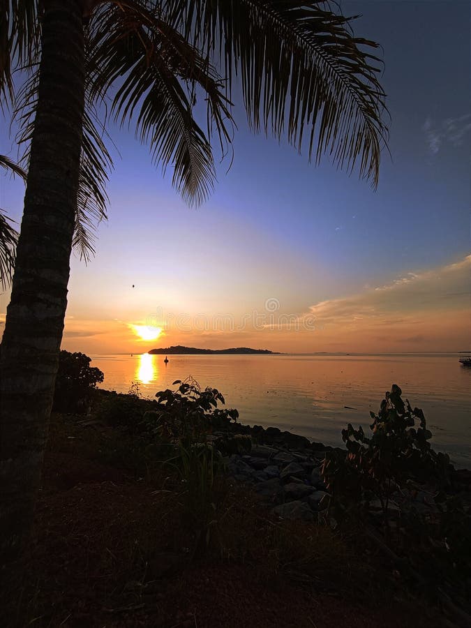 Sunset at the Seaside, Sun Reflection in Water Stock Image - Image of ...