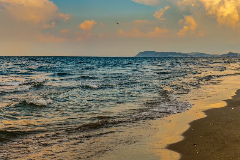 Sunset on seaside stock image. Image of italy, sunset - 121004505