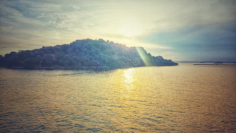 Sunset secret island stock photo. Image of island, sunset - 262634534