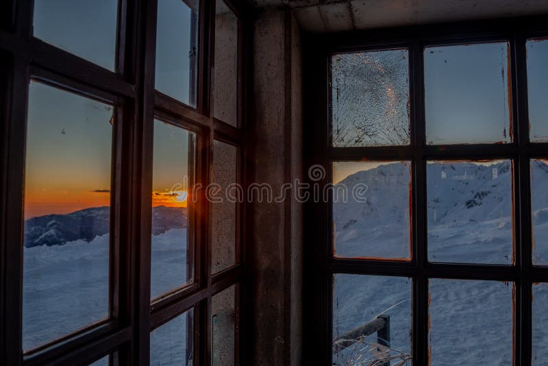Sunset Seen through Window with Chipped Glass Stock Photo - Image of ...