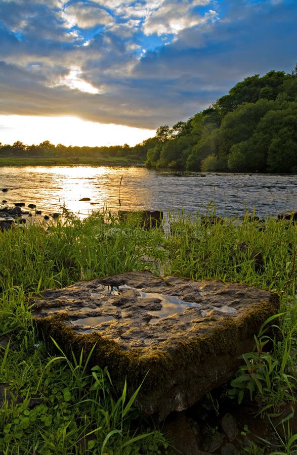 Sunset on the Shannon stock image. Image of rocks, tide - 5774983