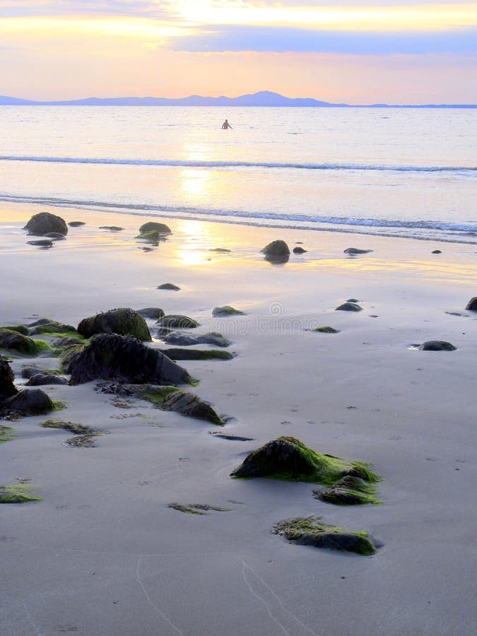 Sunset, Shell Island, Wales. Editorial Photography - Image of rays ...