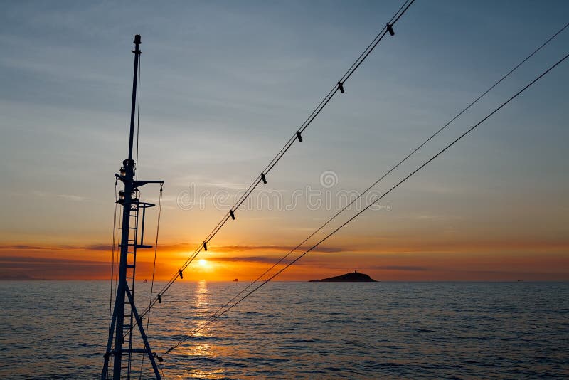 Sunset from the ship stock image. Image of landscape - 64825991