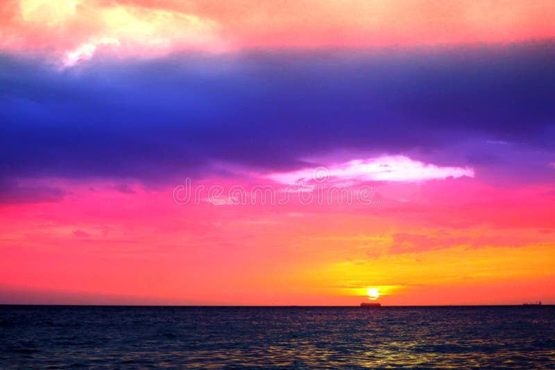 Sunset and Ship on Horizontal Ocean Water Surface Colorful Cloud Stock ...