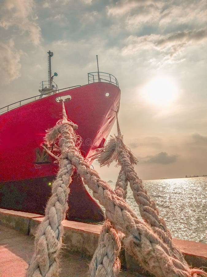 Sunset with ship ropes stock photo. Image of dock5kp - 272727660