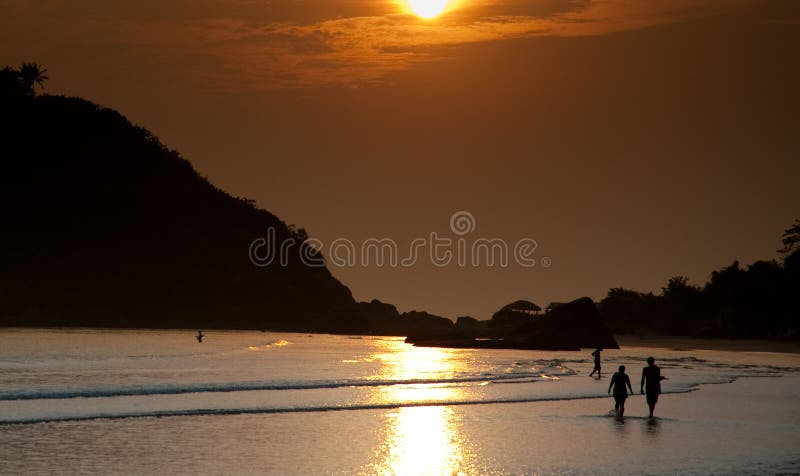 Sunset by the shore stock image. Image of tropics, girl - 12886489