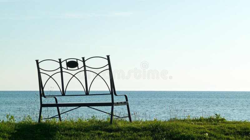 Sunset shore bench stock photo. Image of contemplate - 19852858