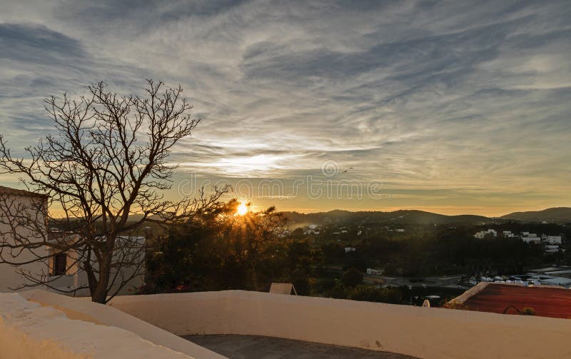 Sunset and single tree stock image. Image of clouds, ibiza - 83566877