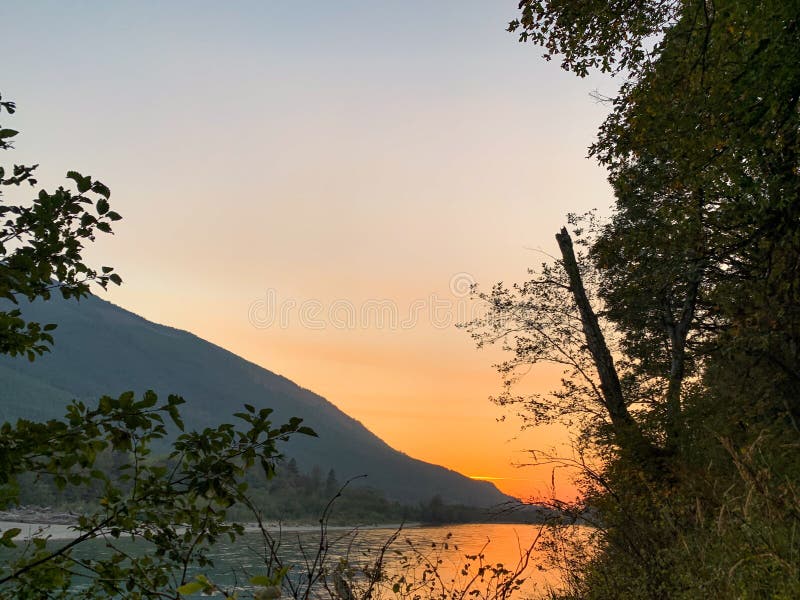 Sunset on the Skagit River stock photo. Image of river - 263699676