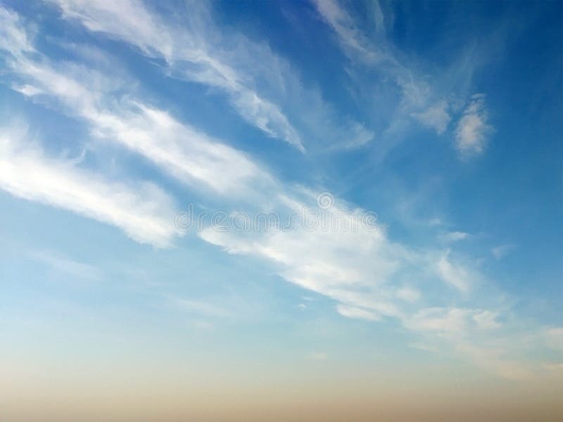 Beautiful Blue Sky with a Few Clouds at Sunset Stock Image - Image of ...
