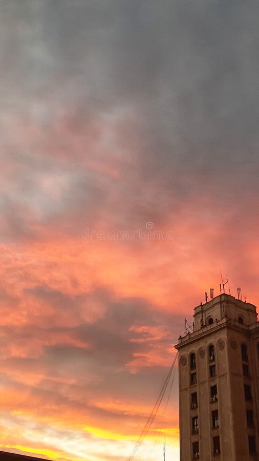 Sunset between blocks stock image. Image of skylight - 179864827