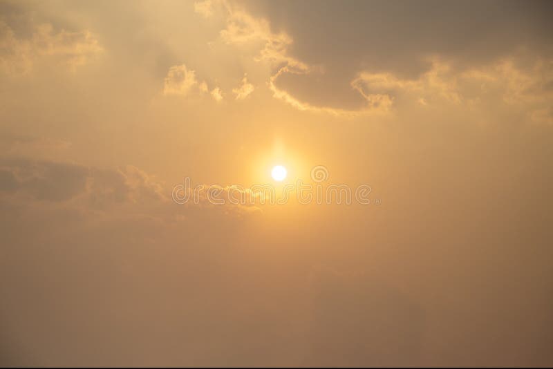 Sunset on the Sky with Clouds. the Sun is in the Middle of the Picture ...