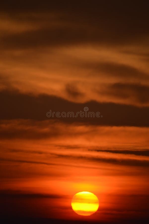 Orange and Yellow Sunset Sky with Clouds Stock Photo - Image of orange ...