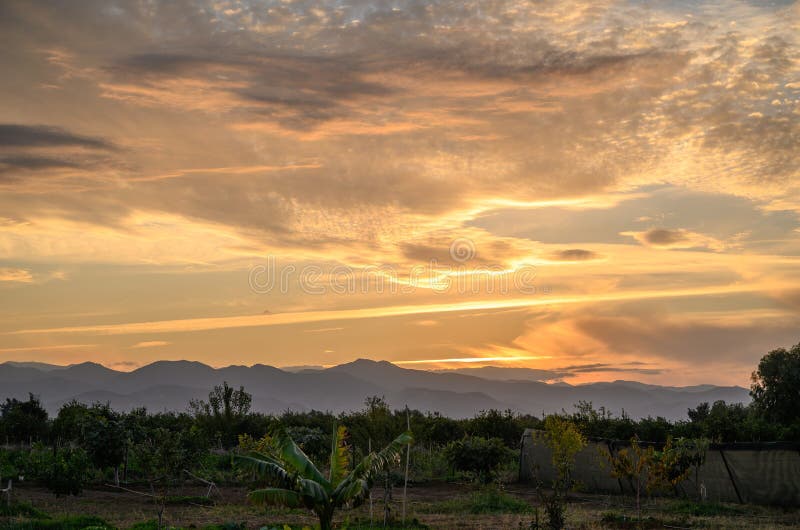 Sunset Sky on the Island of Cyprus, Colorful Clouds and Reflections in ...