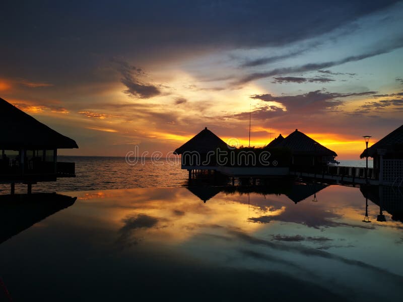 Sunset sky mirror stock image. Image of resort, mirror - 146979847