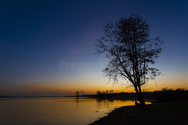 Sunset Sky Over the Calm Sea with a Bright Yellow Sky Stock Photo ...