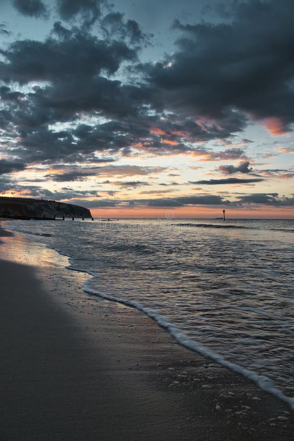 Sunset Sky Over the Wavy Sea, Isle of Wight, England Stock Photo ...