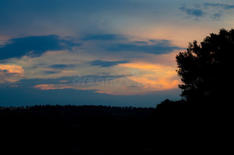 Sunset in the Sky with Rain Clouds Stock Photo - Image of evening ...