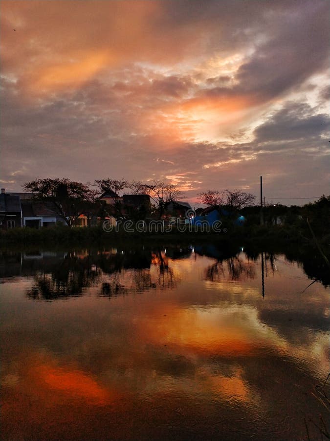 Sunset Sky Reflection stock image. Image of lake, evening - 193021091