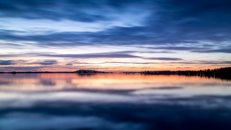 Sunset Sky and Water Reflection Stock Photo - Image of lahti, sunset ...