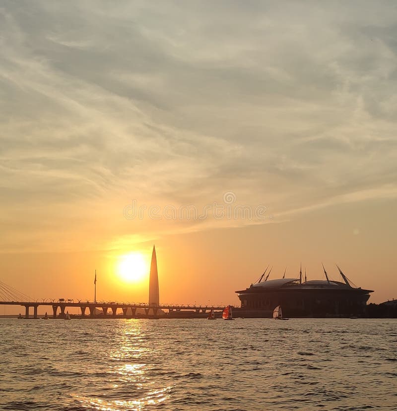 Sunset and skyscraper stock photo. Image of coast, shore - 228974914