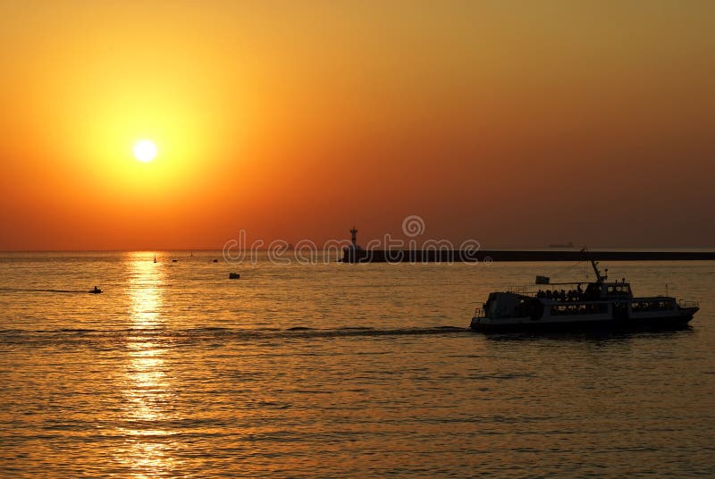Sunset with small boat stock image. Image of abstract - 77354459