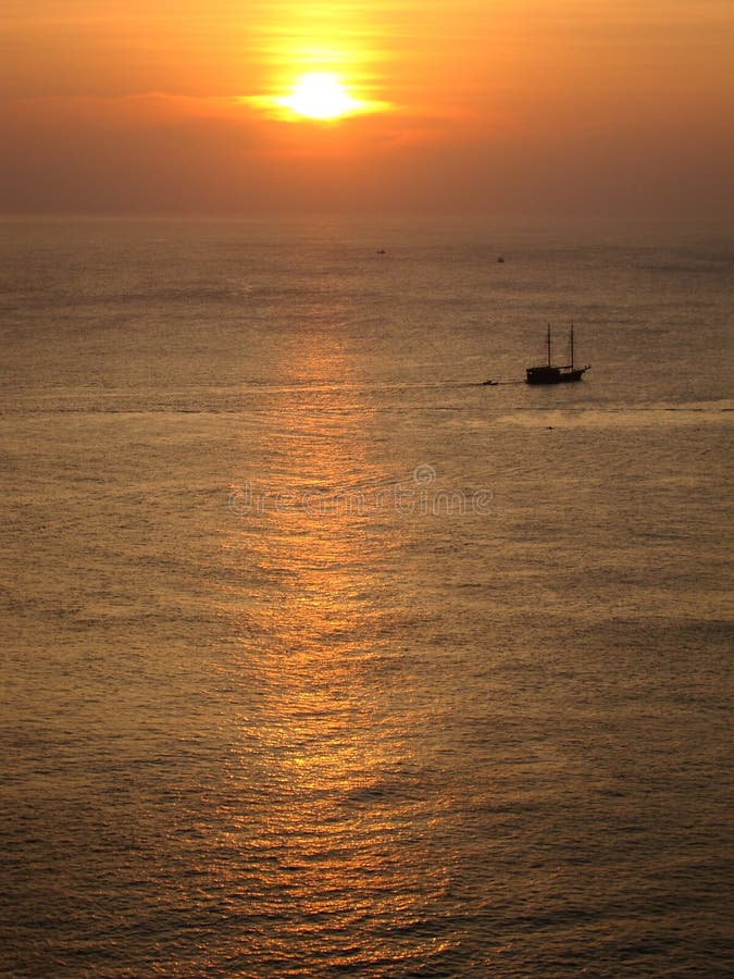 Sunset and small boat stock image. Image of evening, siluate - 32932545