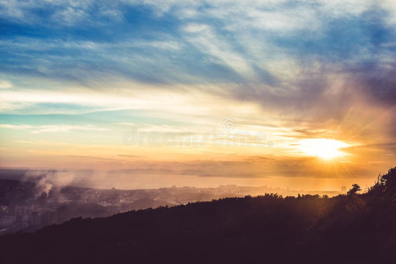 Sunset through smog stock image. Image of sundown, beauty - 180216157
