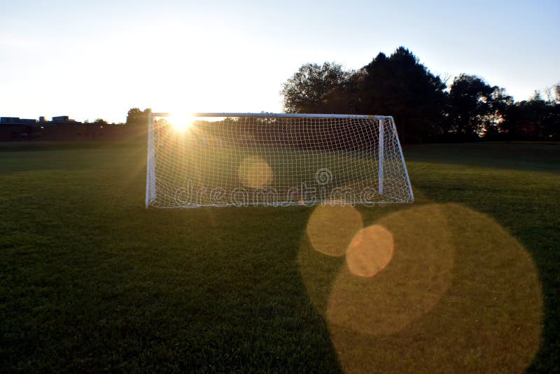 Sunset soccer image stock image. Image of field, exercise - 235377075