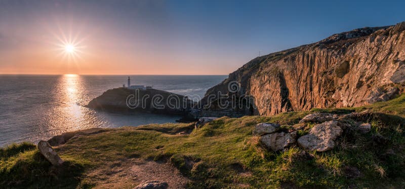 Sunset at South Stack Lighthouse on Anglesey in Wales Stock Photo ...